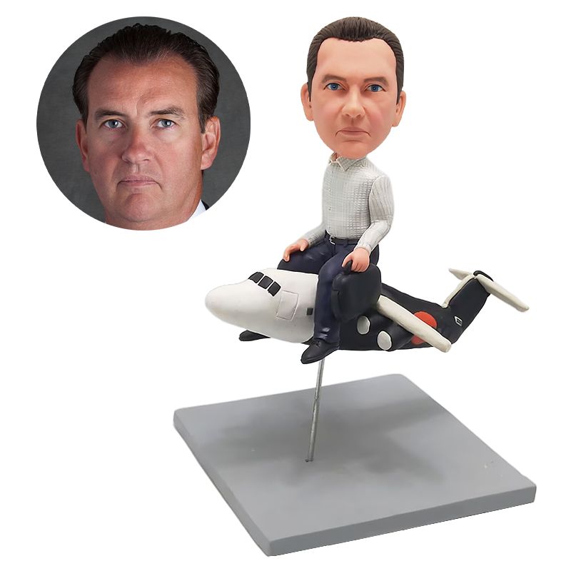 personalized bobble head figure pilot sitting on a plane – Bobblefigurine